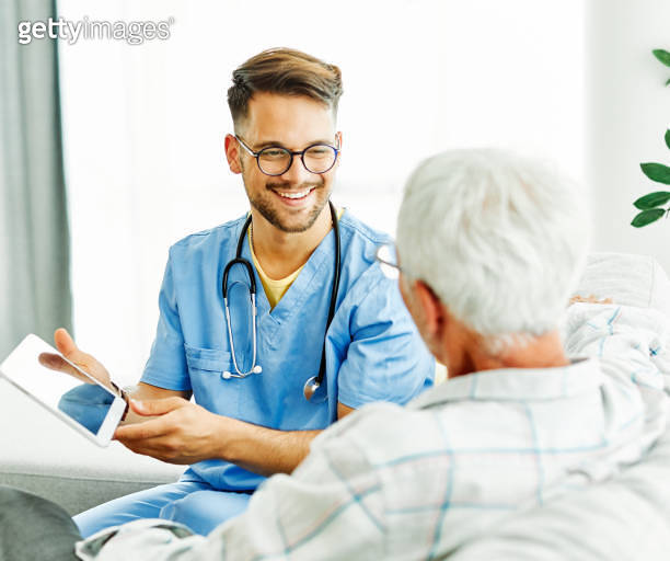 nurse doctor senior care tablet computer technology showing caregiver ...
