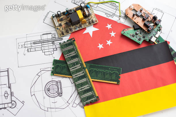 An advanced CPU printed with a national flag of Germany on a neon ...