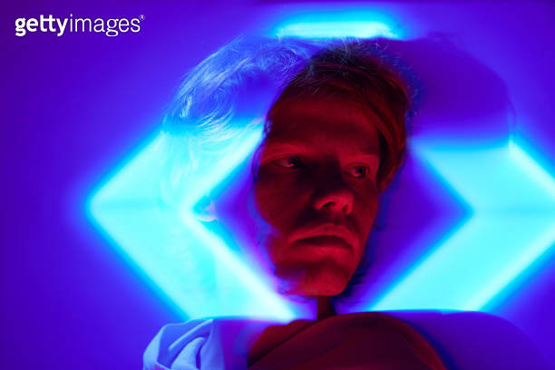 Portrait with long exposure. Young man, attractive guy posing in ...