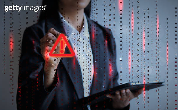 Businesswoman pointing warning signs of hacking cyber triangle. 이미지 ...