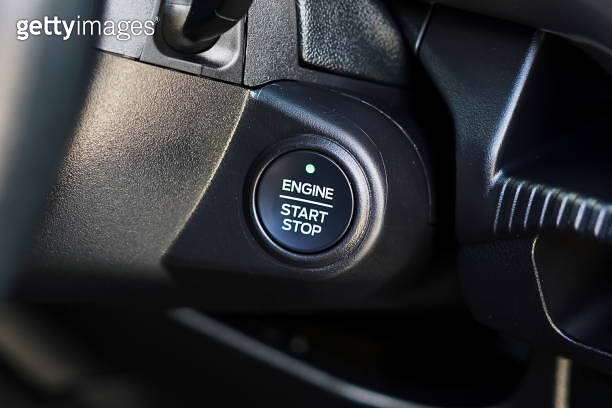 Close up engine car start button. Start stop engine modern new car ...