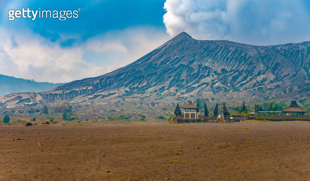 View of Mount Bromo (Gunung Bromo) volcano with the hindu temple Pura ...