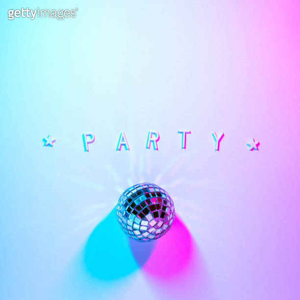 Disco ball with word party in light of cyan and magenta colors. Neon ...
