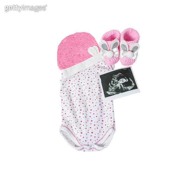 expecting the birth of a child, baby suit, pair of baby shoes, baby cap ...