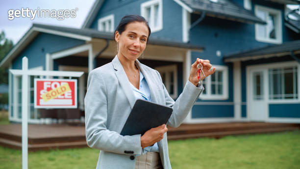 Portrait of an Intelligent Real Estate Agent in Smart Suit Holding Keys ...