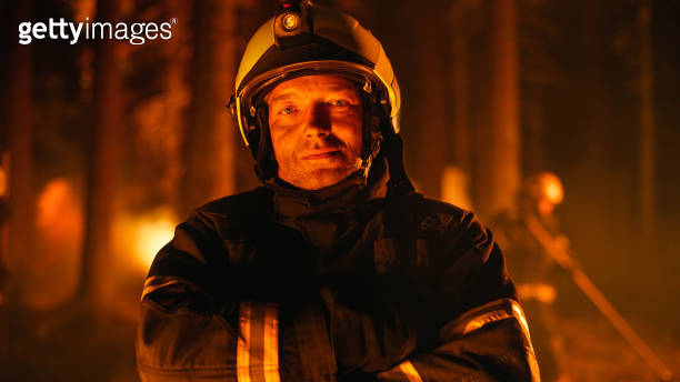Portrait of a Brave Handsome Young Adult Firefighter in Safety Uniform ...