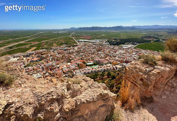 Buildings, houses and streets in city, aerial view. View of rooftops ...