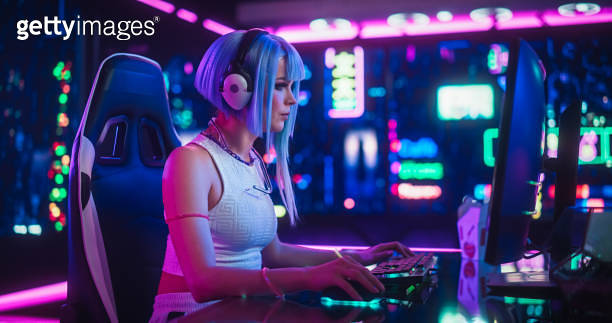 Professional Beautiful Female eSports Gamer Playing Video Game on a ...