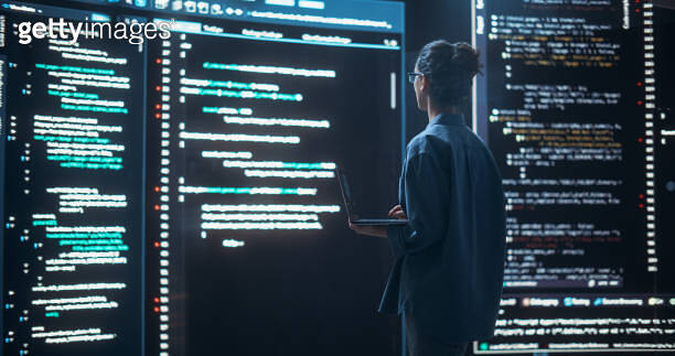 Shot of Female Programmer Working in a Monitoring Control Room ...