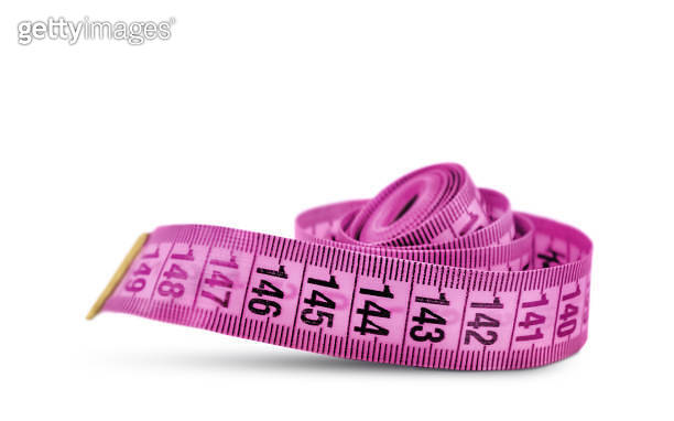 the pink measuring tape is highlighted on a white background 이미지 ...