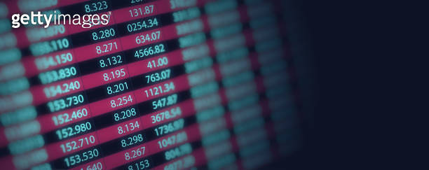 Abstract financial chart and numbers in stock market with neon light ...