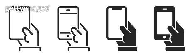 Smartphone in hand icons set. Hand holding smartphone. Smartphone ...