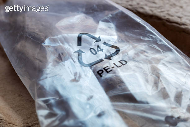 Plastic recycling symbol 04 PE-LD on packaging. Low-density ...