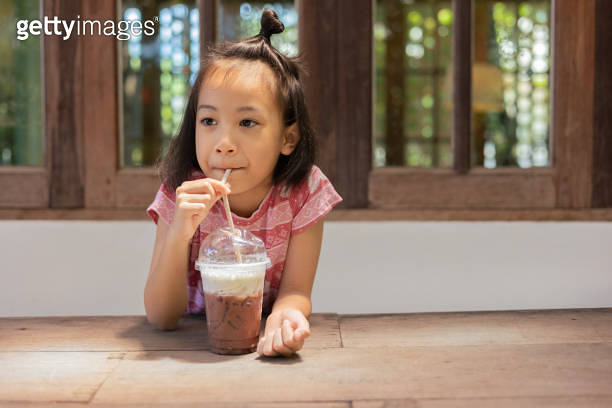 Cheerful and positive living, where people, asian adorable kid sips of ...