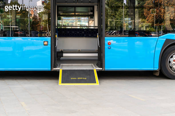Bus ramp low floor. Accessibility in public transport. Bus ramp low ...