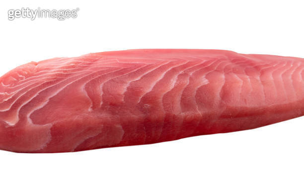 Yellow fin tuna steak isolated on white background. Fresh rare tuna ...