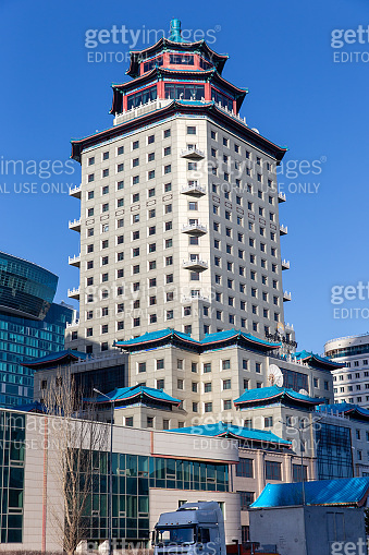 High-rise building Beijing Palace Soluxe hotel in form of Chinese ...