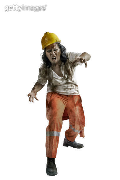 A scary construction worker zombie with blood and wounds on his body ...