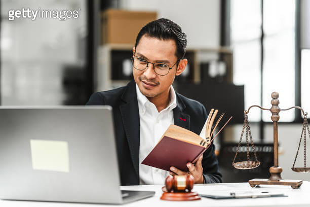 Handsome businessman lawyer of Indian descent. trusted litigation ...