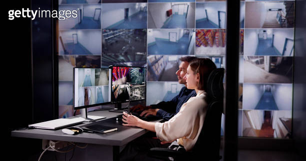 Surveillance Operator Controls Multiple CCTV Cameras 이미지 (1797953493 ...