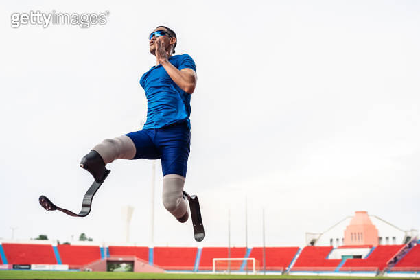 Asian para-athletes disabled with prosthetic blades running at stadium ...