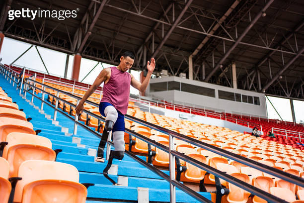 Asian para-athletes disabled with prosthetic blades running at stadium ...