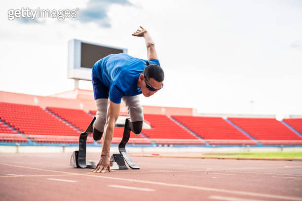 Asian para-athletes disabled with prosthetic blades running at stadium ...