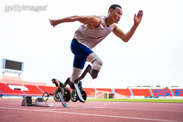 Asian para-athletes disabled with prosthetic blades running at stadium ...