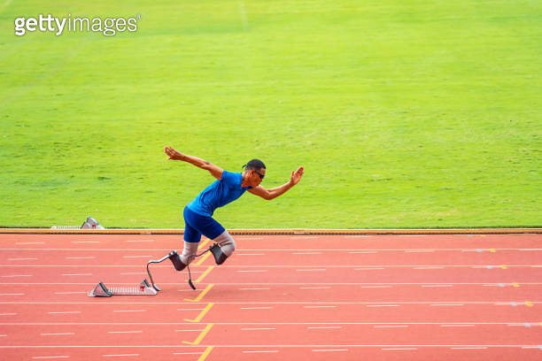 Asian para-athletes disabled with prosthetic blades running at stadium ...