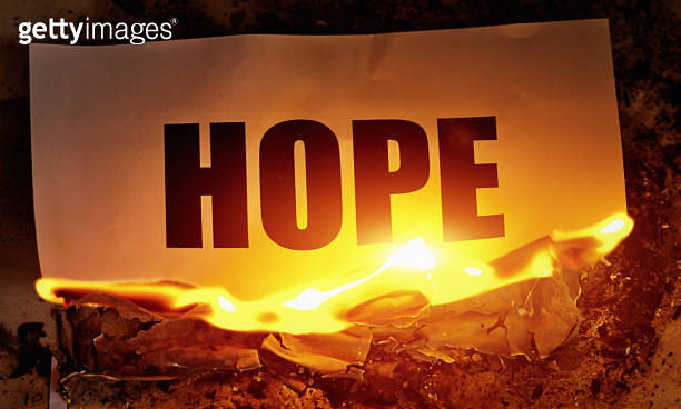 Hope is destroyed: the word goes up in flames, representing despair 이미지 ...