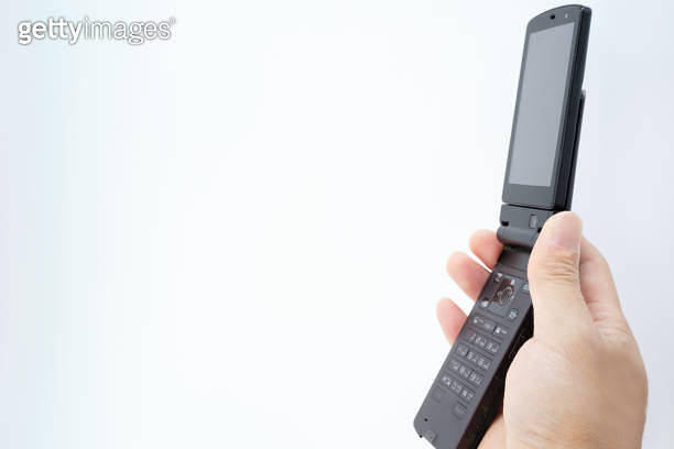 Image material of a person calling on a flip phone 이미지 (1742083735 ...