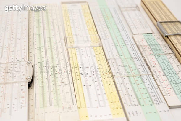 group of old slide rule slipstick analogue computer for mathematical ...