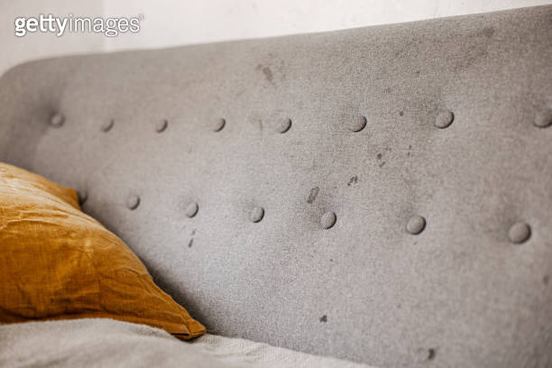Dirty sofa, close up view. Stains on home textile. Upholstered ...
