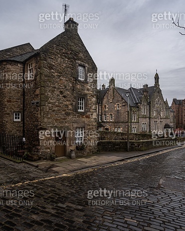 Row of traditional stone structures in Dean Village, Edinburgh ...