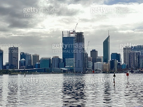 Scenic view of cityscape Perth surrounded by water and buildings 이미지 ...