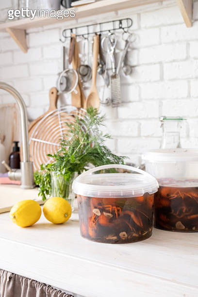Homemade Crawfish in plastic buckets on kitchen counter, food delivery ...
