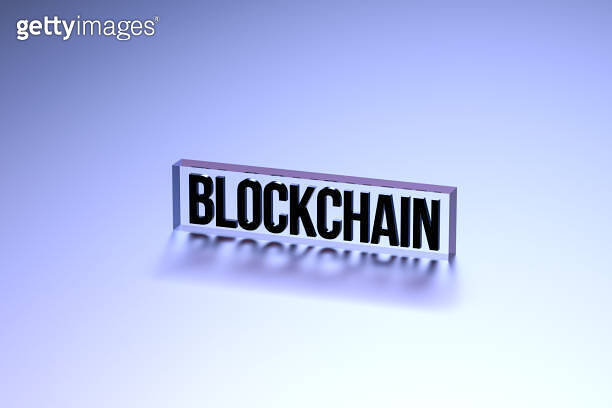BLOCKCHAIN abstract text concept. Blockchain one word in a glass block ...