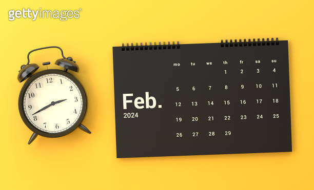 Alarm Clock And 2024 February Calendar On Yellow Background (1789206038 ...
