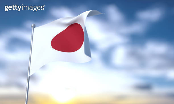 Japanese Flag On Blue Sky 이미지 (1700732969) - 게티이미지뱅크