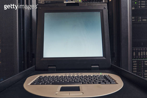 The monitor screen in the server room displays important information ...