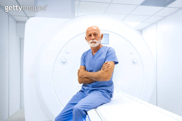 Portrait of senior man patient ready for MRI diagnistic scanning test ...