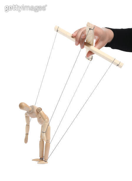 Woman pulling strings of puppet on white background, closeup 이미지 ...