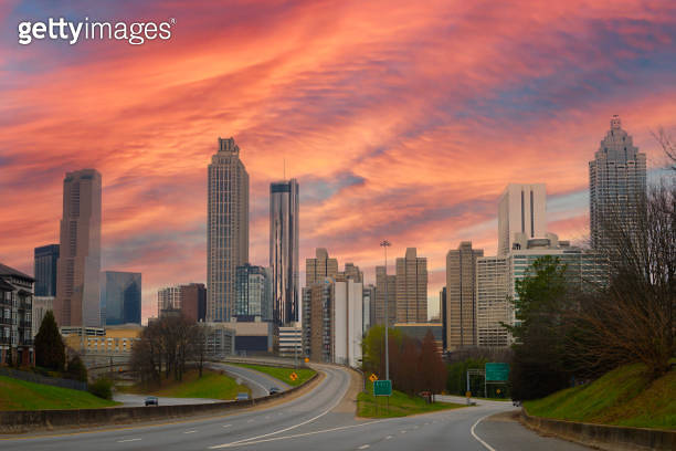 Atlanta City skyline with skyscrapers, buildings, and sunset clouds ...