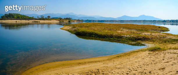 Daegu City nature landscape in autumn, tranquil riverbank, curving sand ...