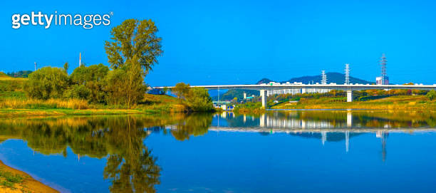 Daegu City nature landscape in autumn, tranquil riverbank, forest, and ...