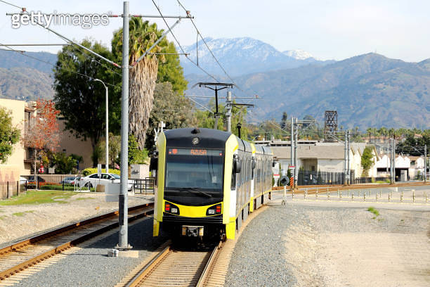 Los Angeles Metro Gold Line Train departing from Azusa Downtown Station ...