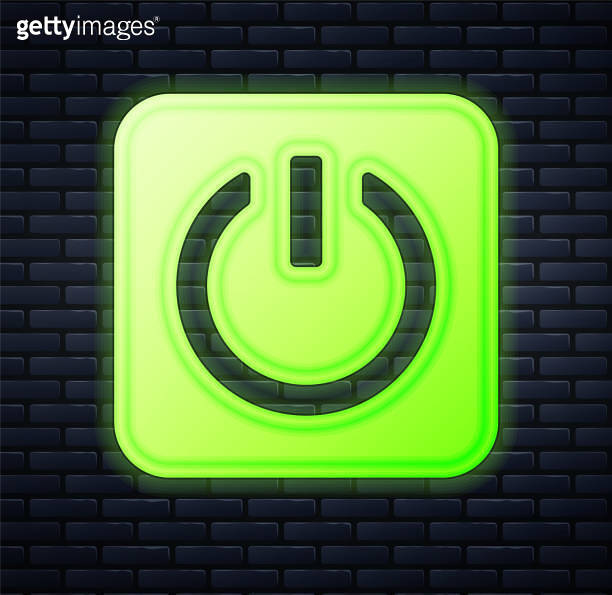 Glowing neon Power button icon isolated on brick wall background. Start ...
