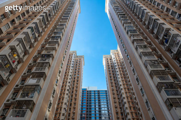 Low angle vision of high-rise social housing buildings and financial ...