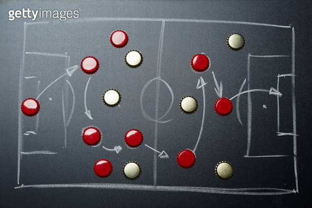 Football soccer tactic strategy scheme plan made of beer bottle caps ...
