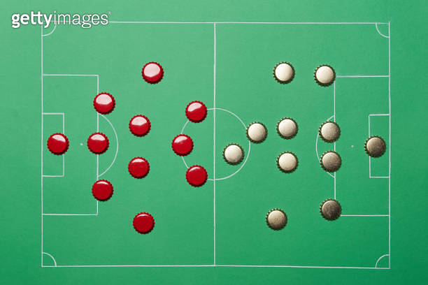 Football soccer tactic strategy scheme plan made of beer bottle caps ...